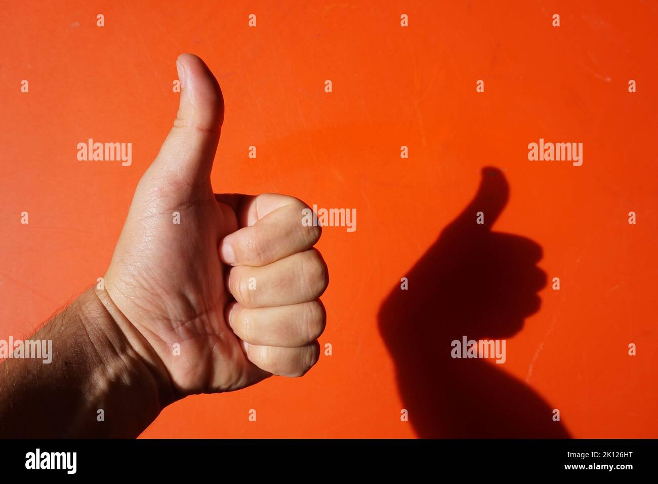 all is well hand sign and shadow Stock Photo - Alamy