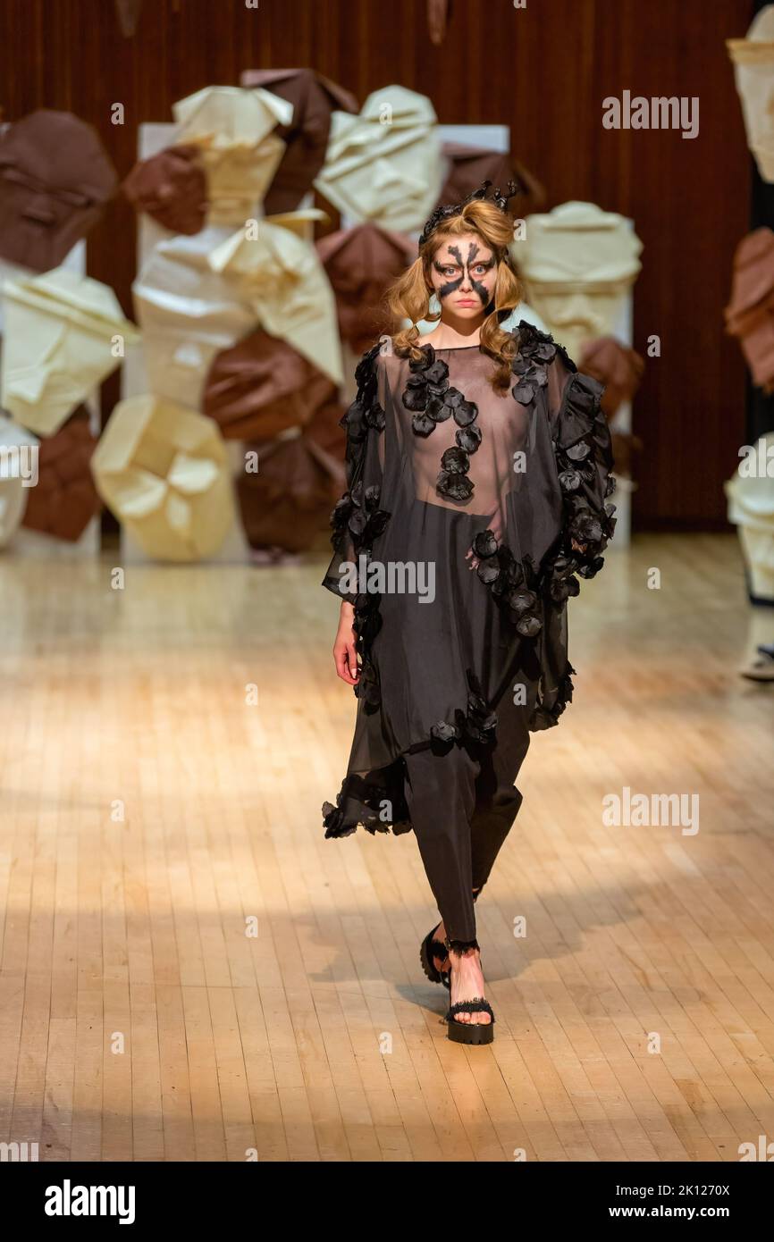 A model walks the runway at the VIN + OMI 'Opinions' catwalk show ...