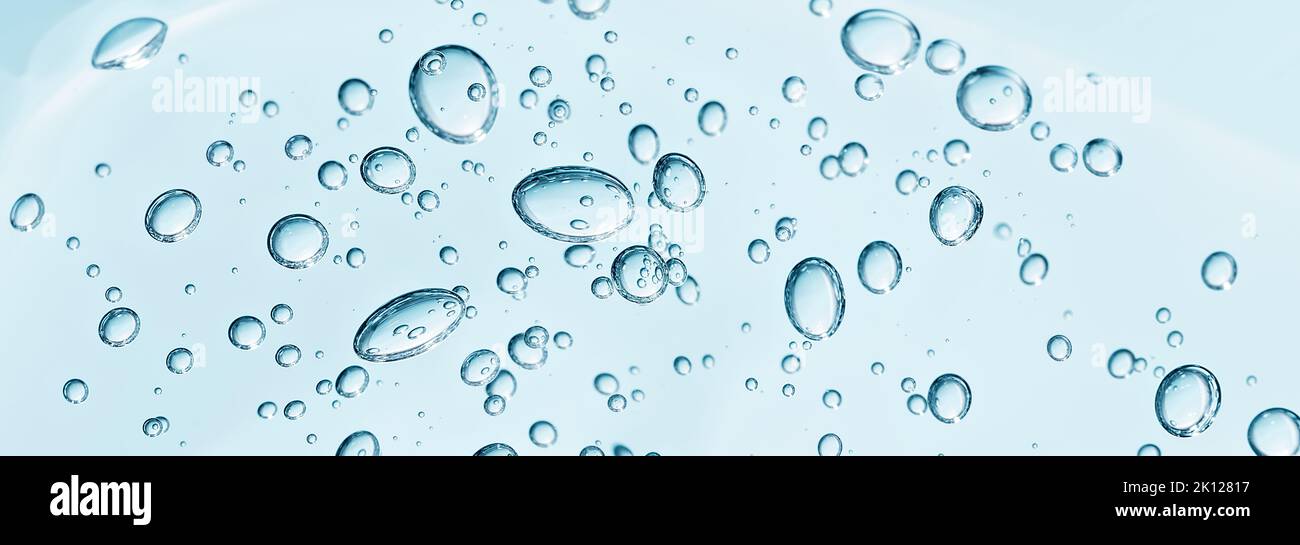 Close up macro Aloe vera gel cosmetic texture blue background with ...