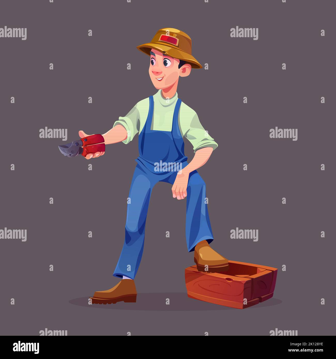 Man gardener in hat with secateurs and wooden crate isolated on ...