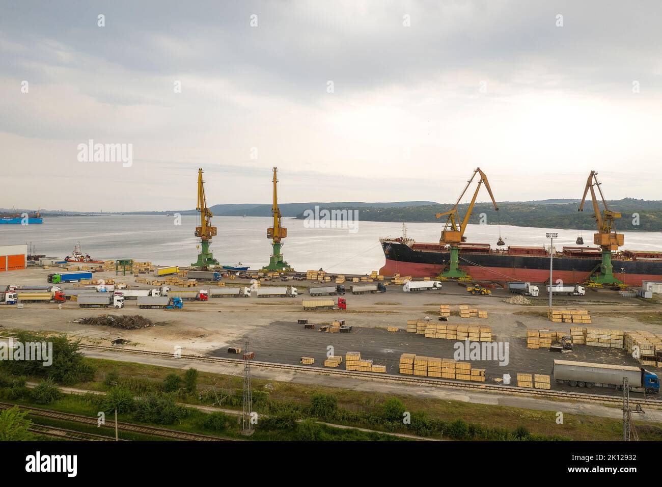 Aerial view from drone of loading the cargo ship. Work in port Stock ...