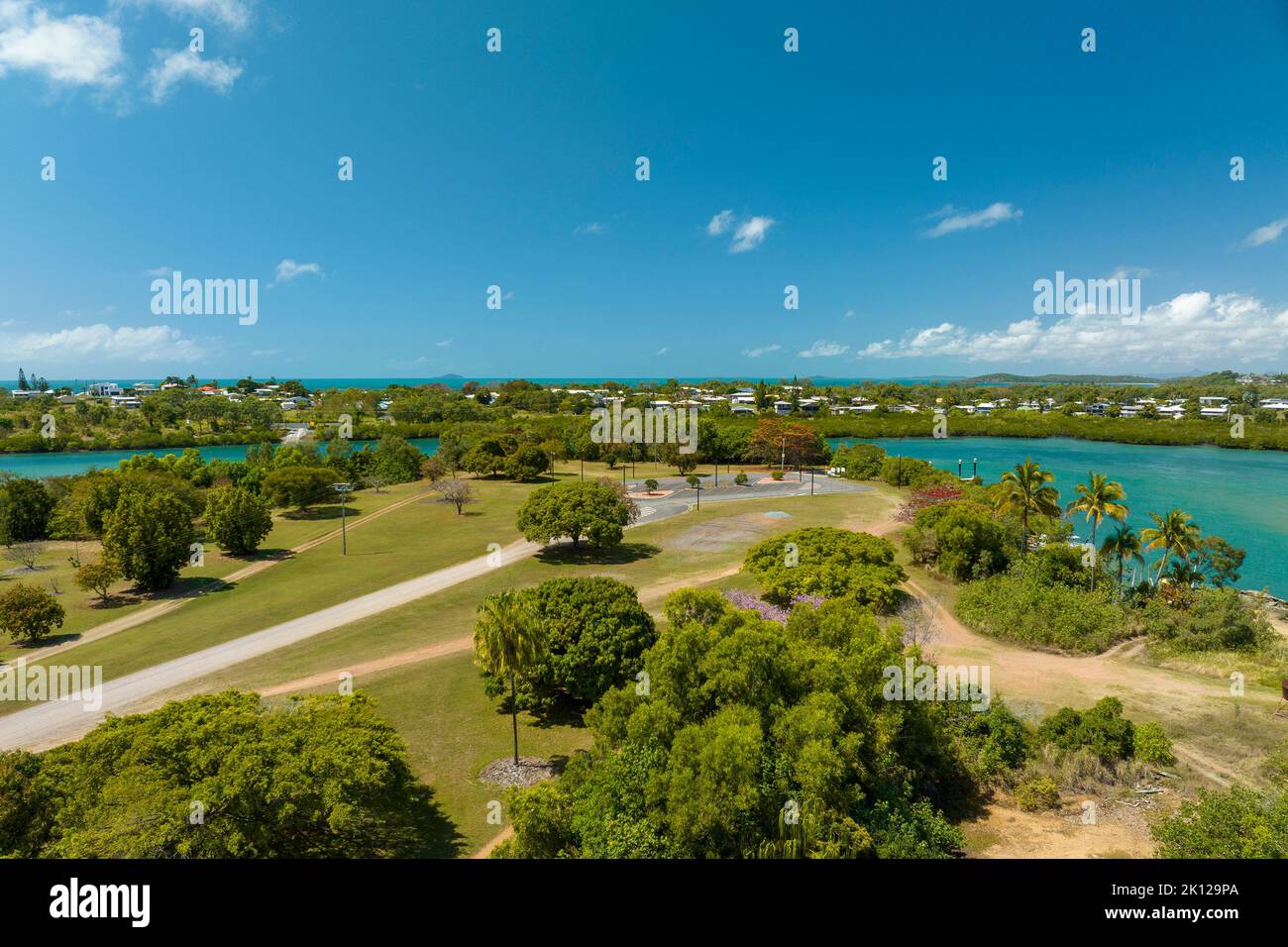 Aerial view by drone of Grasstree Beach and the parking area near the ...