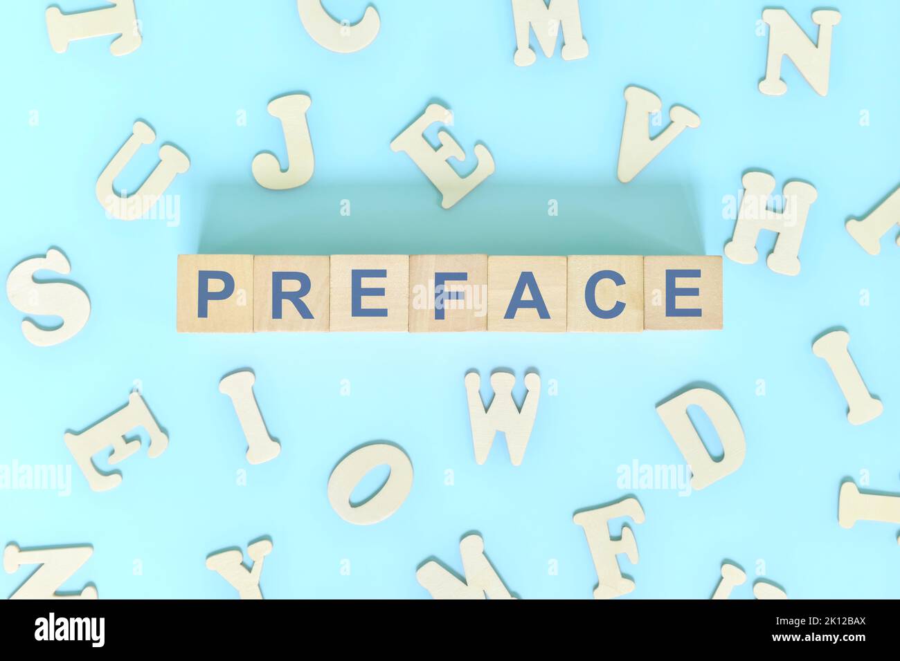Preface part of a book concept. Wooden blocks typography word flat lay ...