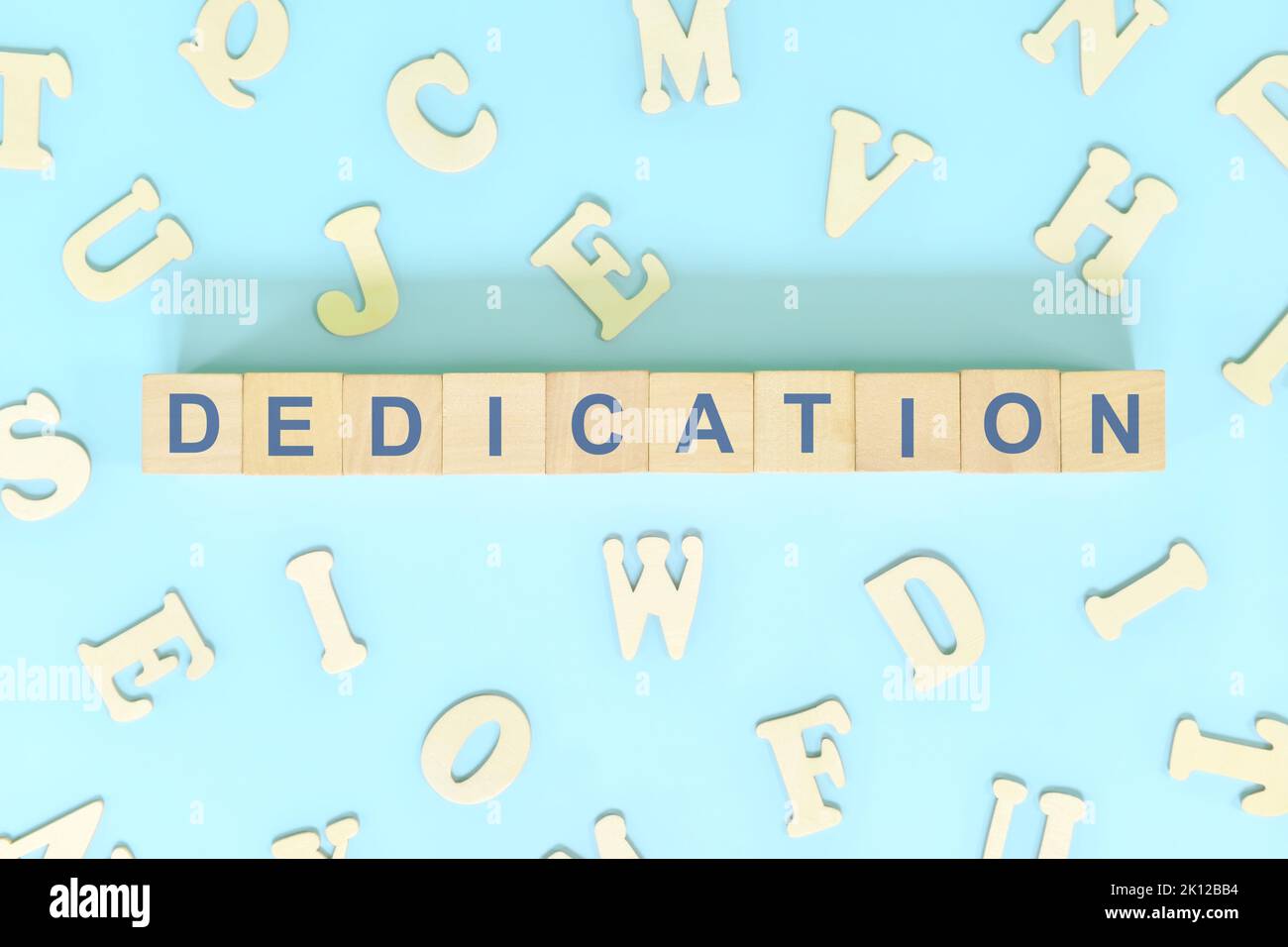 Dedication part of a book concept. Wooden blocks typography word flat ...