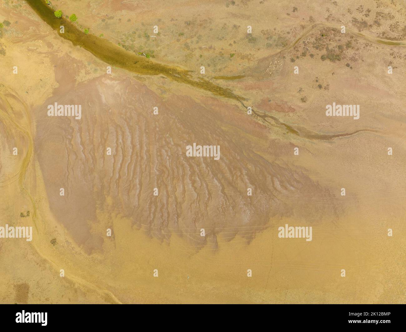 Patterns in the sand at low tide. Drone aerial view Stock Photo - Alamy