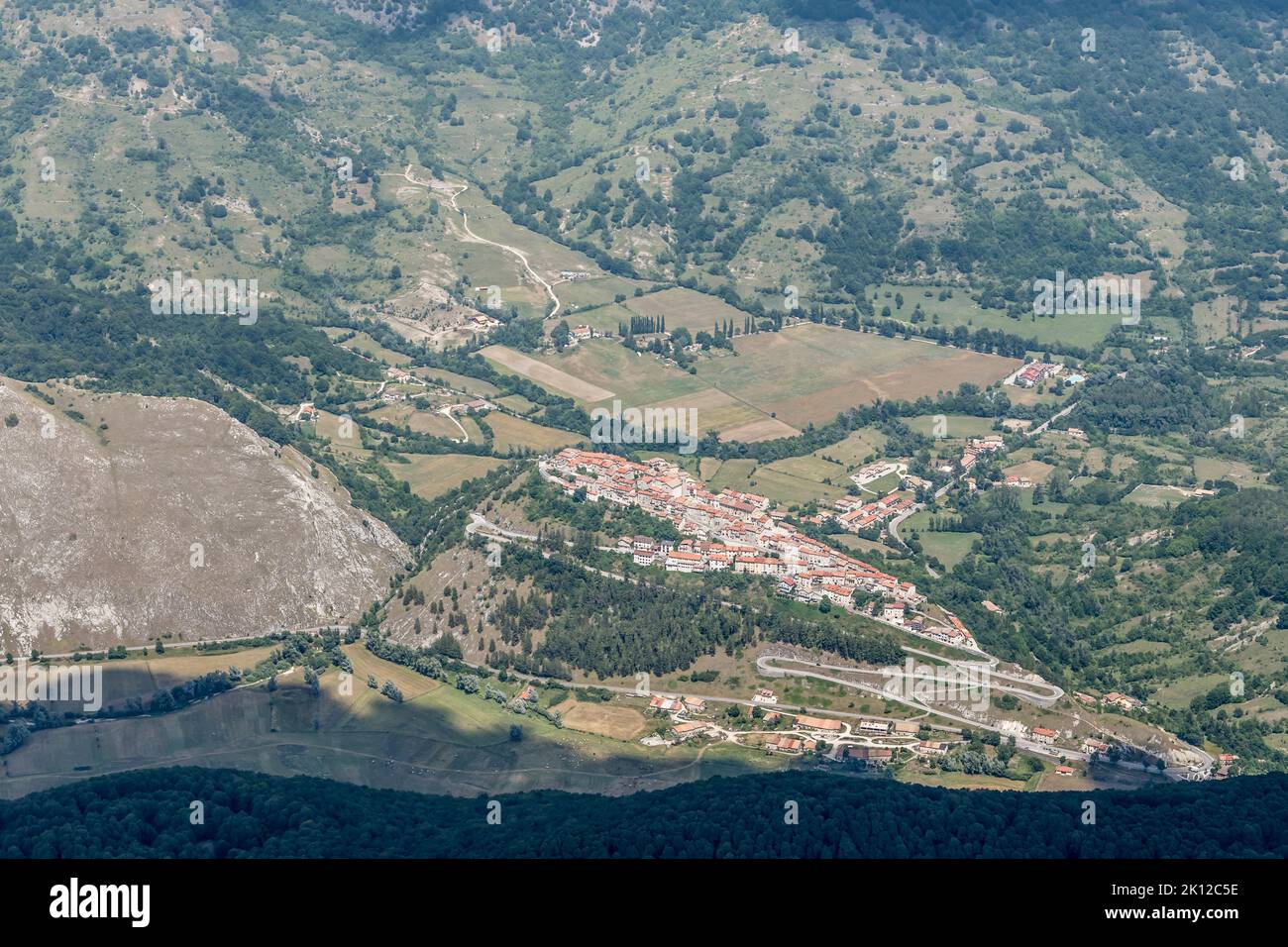 aerial shot, from a small plane, of Opi hilltop village in Sangro river ...