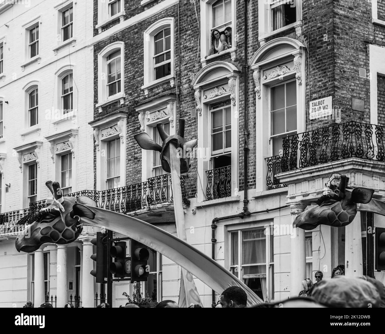 Revellers Watch On From Their Home Of The Notting Hill Carnival Stock