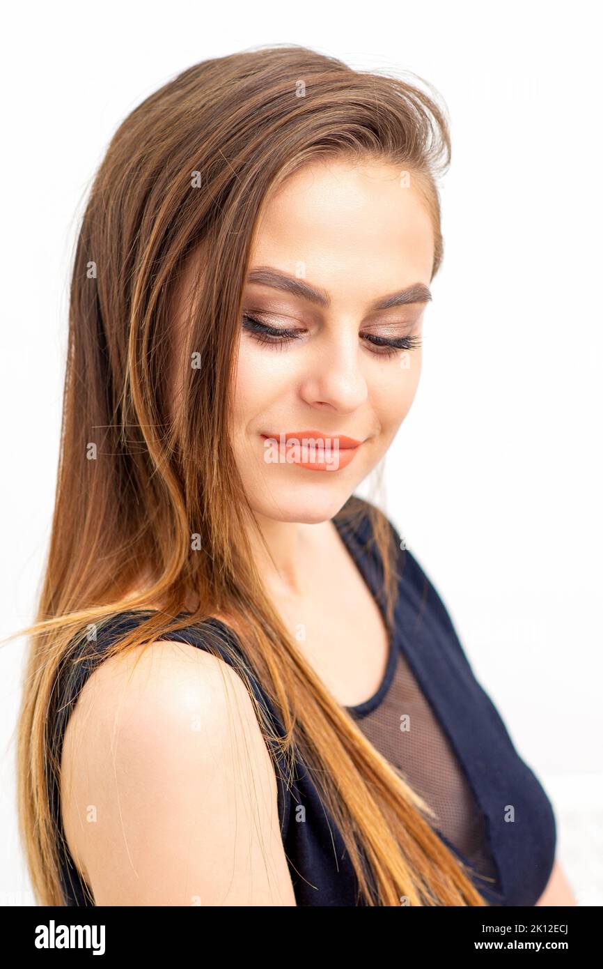 Portrait of a beautiful young caucasian smiling brunette woman with ...