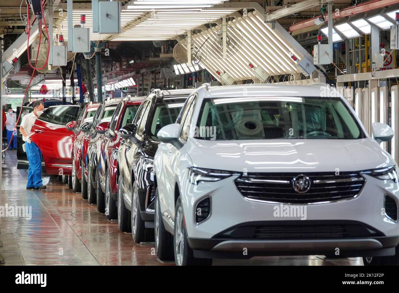 YANTAI, CHINA - SEPTEMBER 14, 2022 - Workers work on an automobile ...