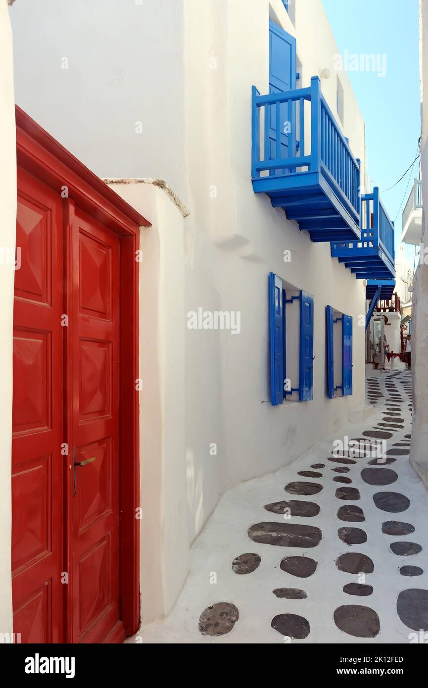 Narrow colorful street in old part of Chora of Mykonos island Greece ...