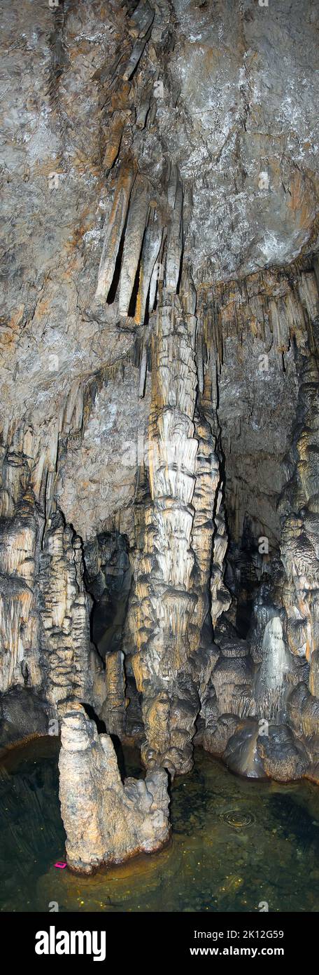 Stalagmite and underground lake in the Psychro Cave, Crete, Greece ...