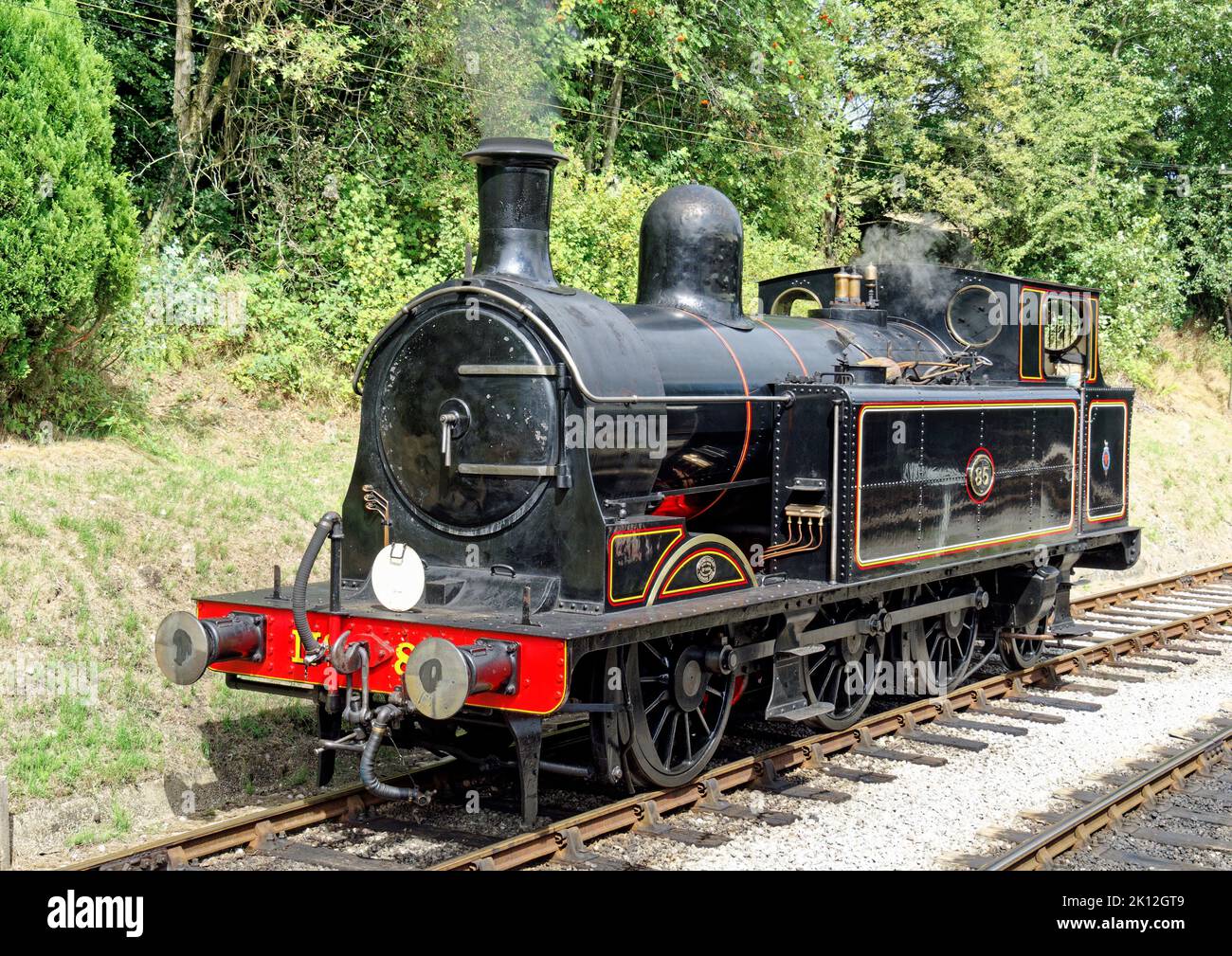 Preserved Taff Vale Railway 0-6-2 tank loco running round its traikn at Oxenhope statiojn on the ...