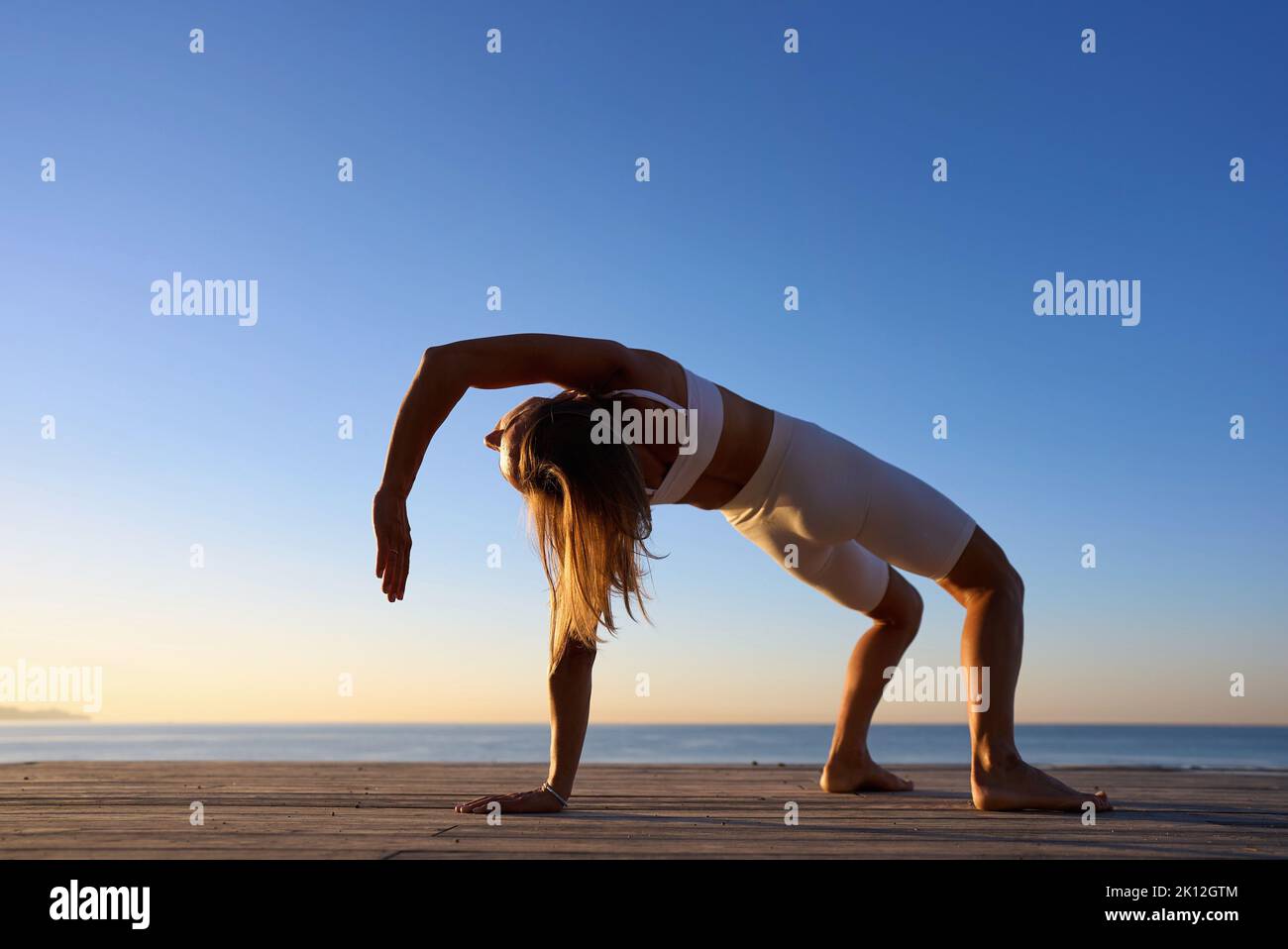 Woman crab position hi-res stock photography and images - Alamy