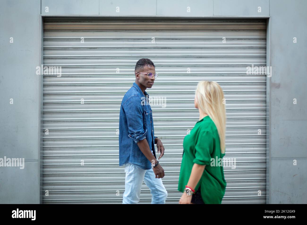 Different people looking at each other hi-res stock photography and ...