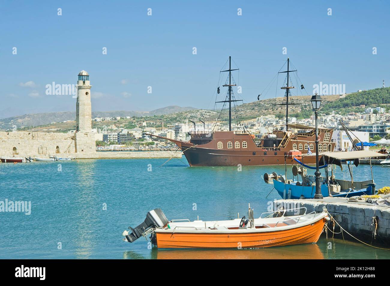 Venetian harbor of Chania, Crete, Greece with lighthouse Stock Photo ...