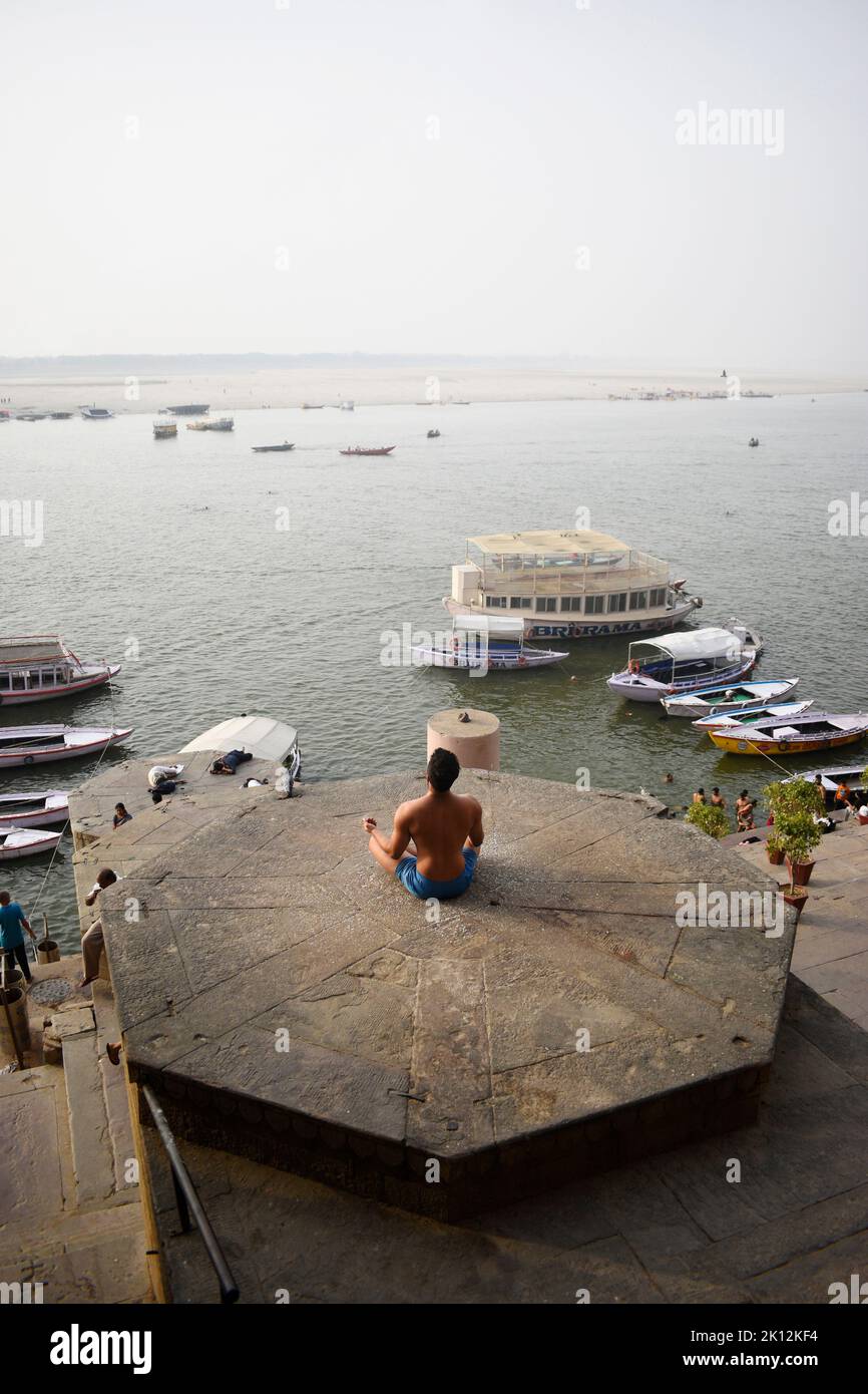 Man meditating on the Dashashwamedh ghat, Varanasi, India Stock Photo ...