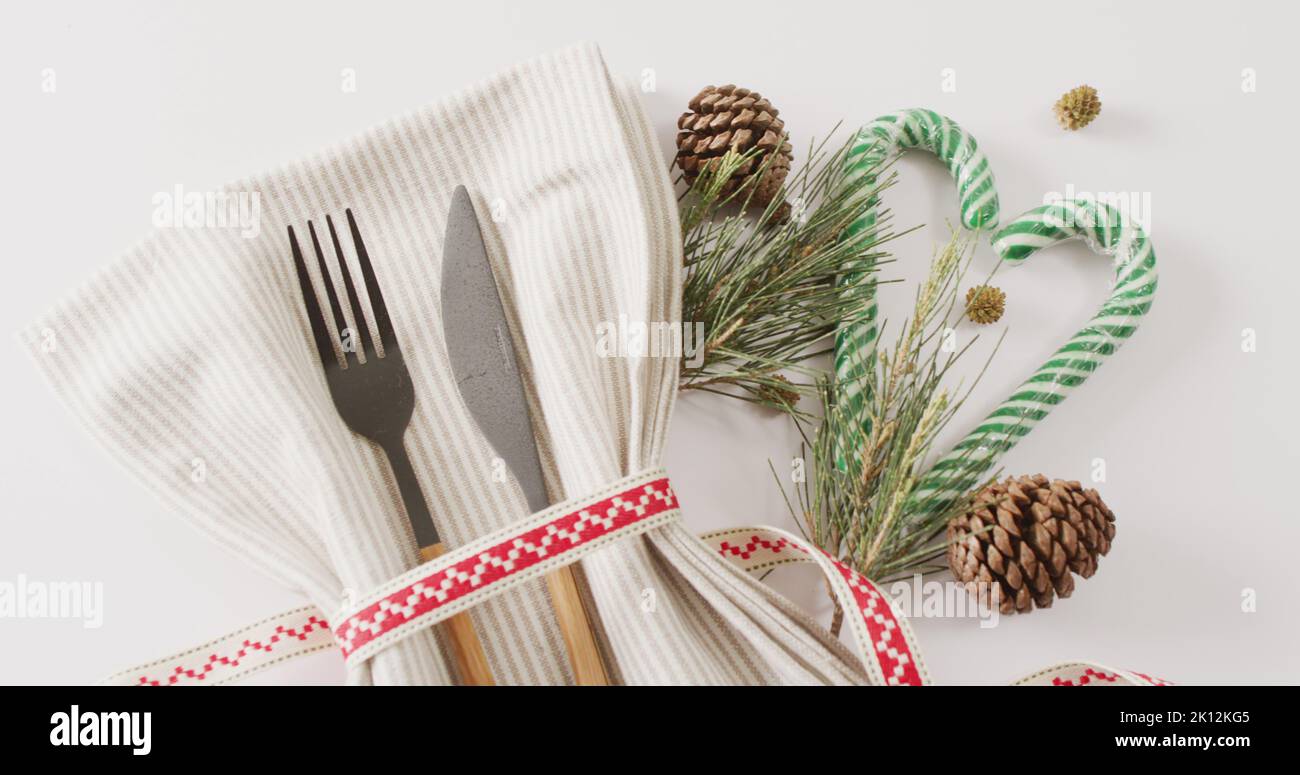 Image of christmas place setting with cutlery and copy space on white ...