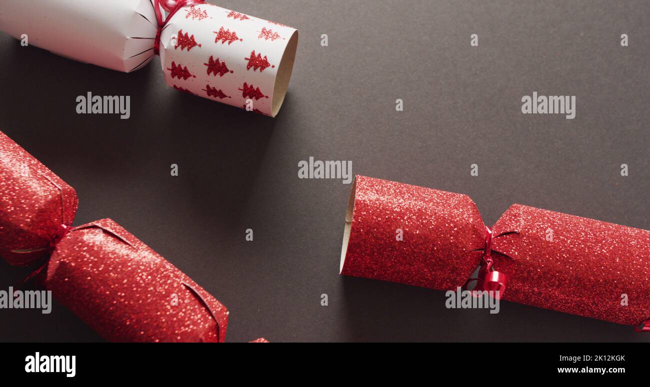Image of red and white christmas crackers on grey background Stock ...