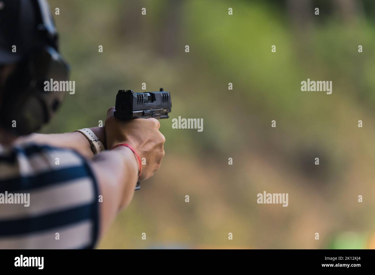 Handgun shoot bullet fire hi-res stock photography and images - Alamy