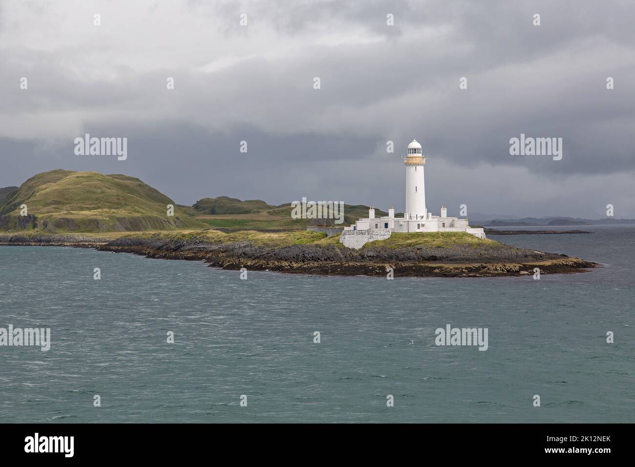 Grey clouds lighthouse britain hi-res stock photography and images - Alamy
