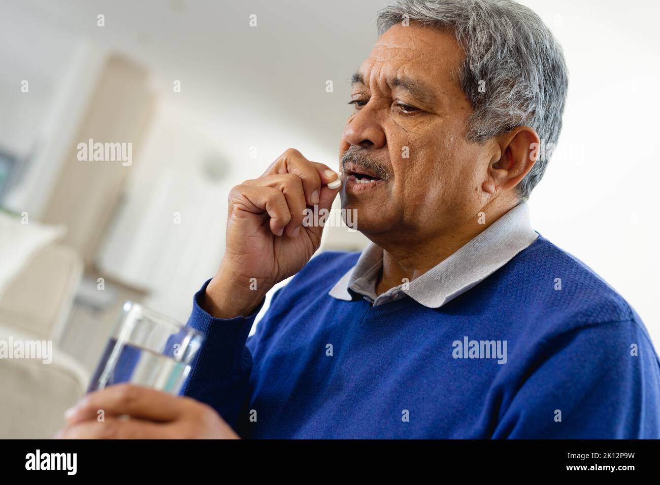 Person taking tablet hi-res stock photography and images - Alamy