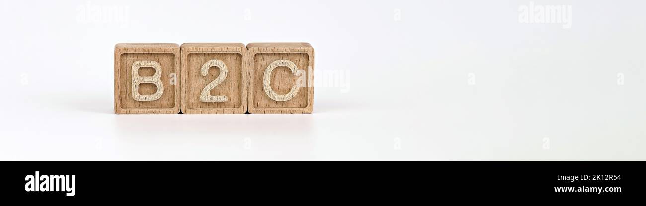 B2C business-to-consumer business relationship banner. wooden cubes ...