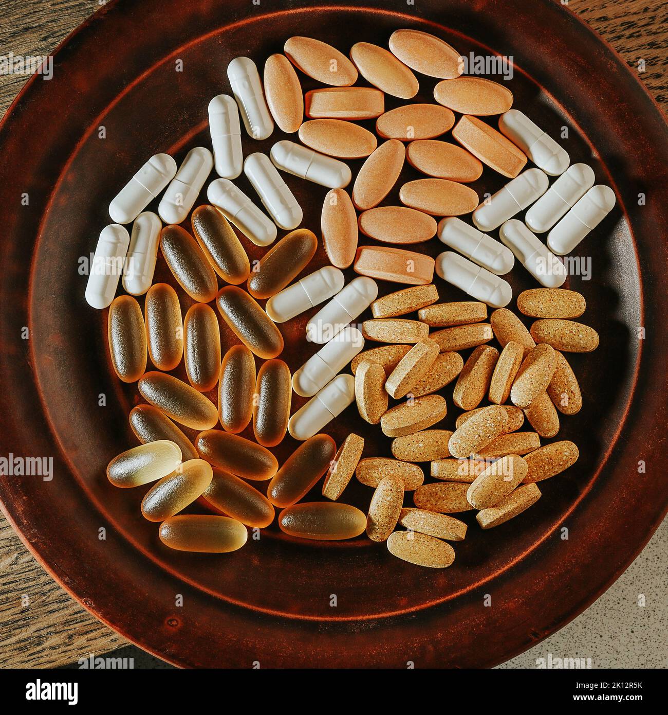 pills top view. magnesium taurate, monolaurin, ultra omega-3 and ...