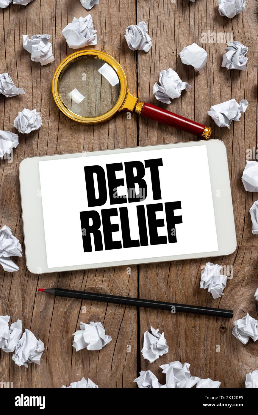 Writing displaying text Debt Relief. Word Written on partial or total ...