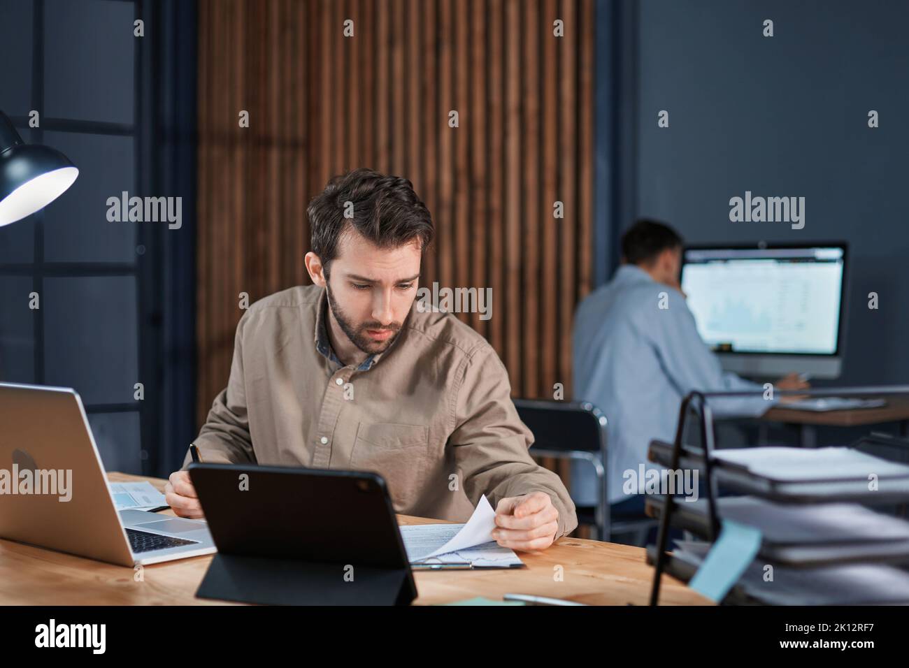 employees working in the office until late at night Stock Photo - Alamy
