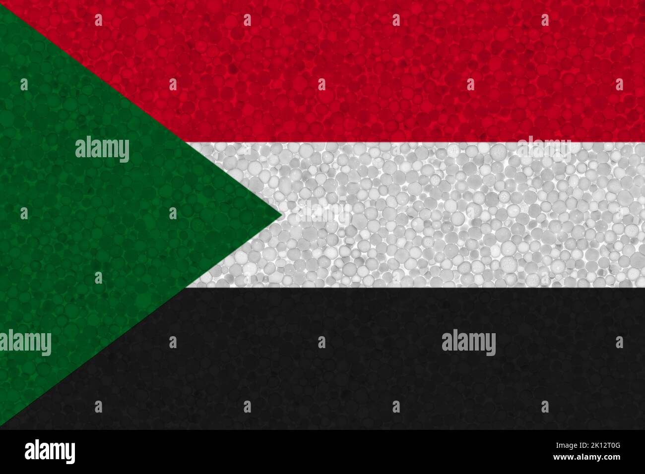 Flag of Sudan on styrofoam texture. national flag painted on the ...