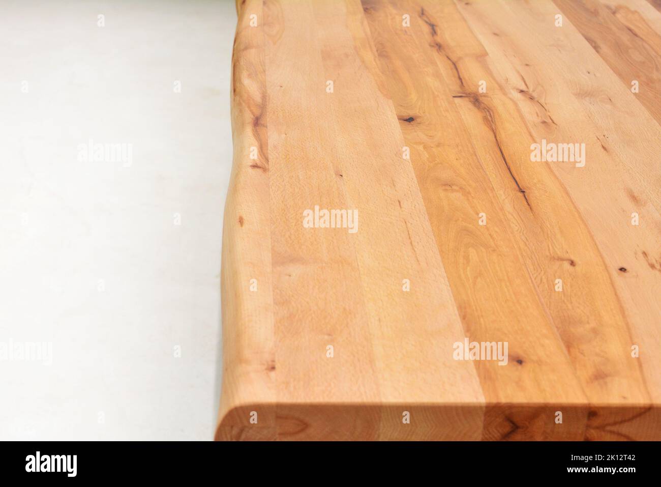 Wooden dinner table surface. Natural wood furniture close view ...