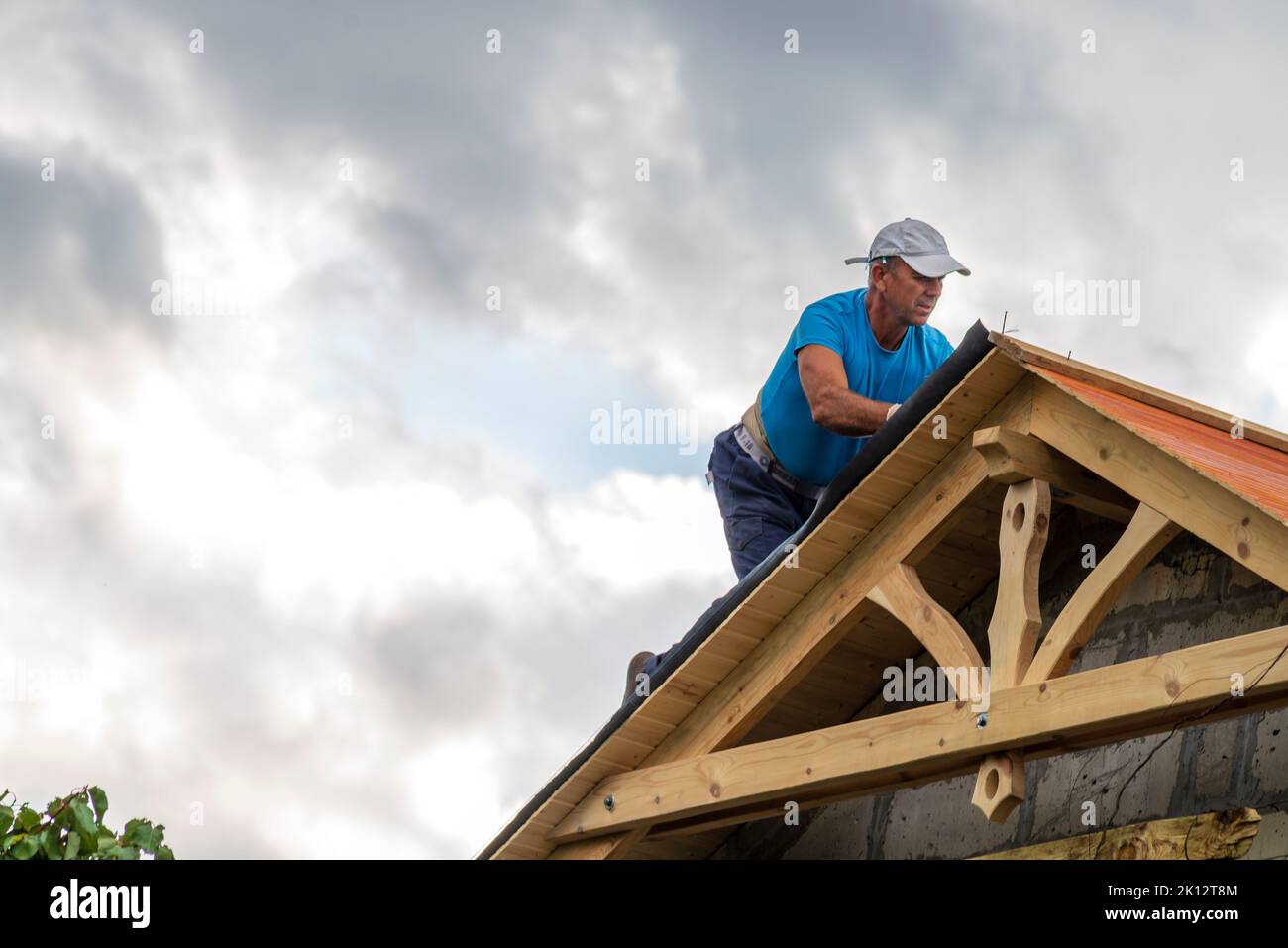 Roofer man roof carpenter working Country house renovation Stock Photo ...