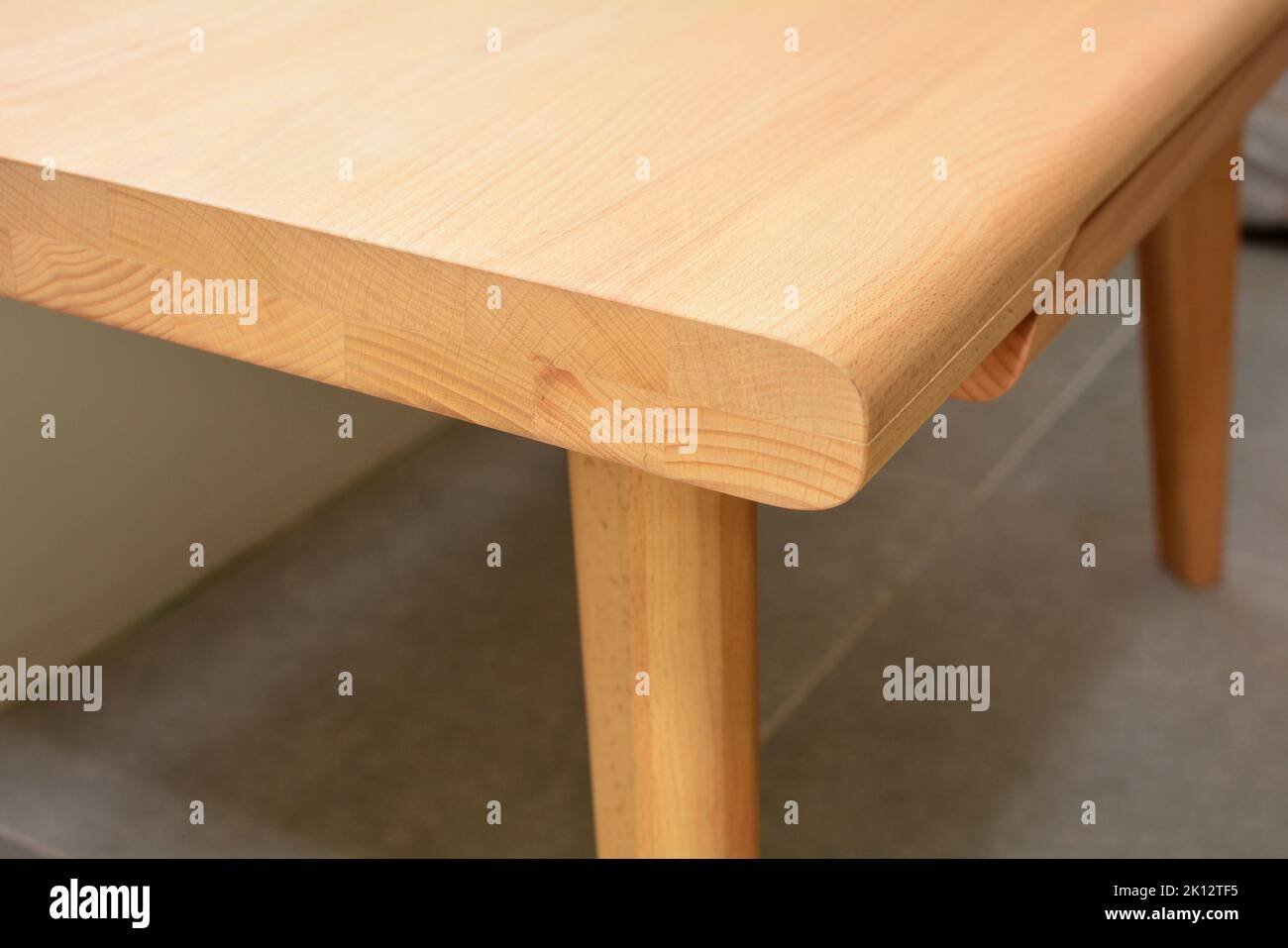 Wooden table corner and surface. Natural wood close view photo ...