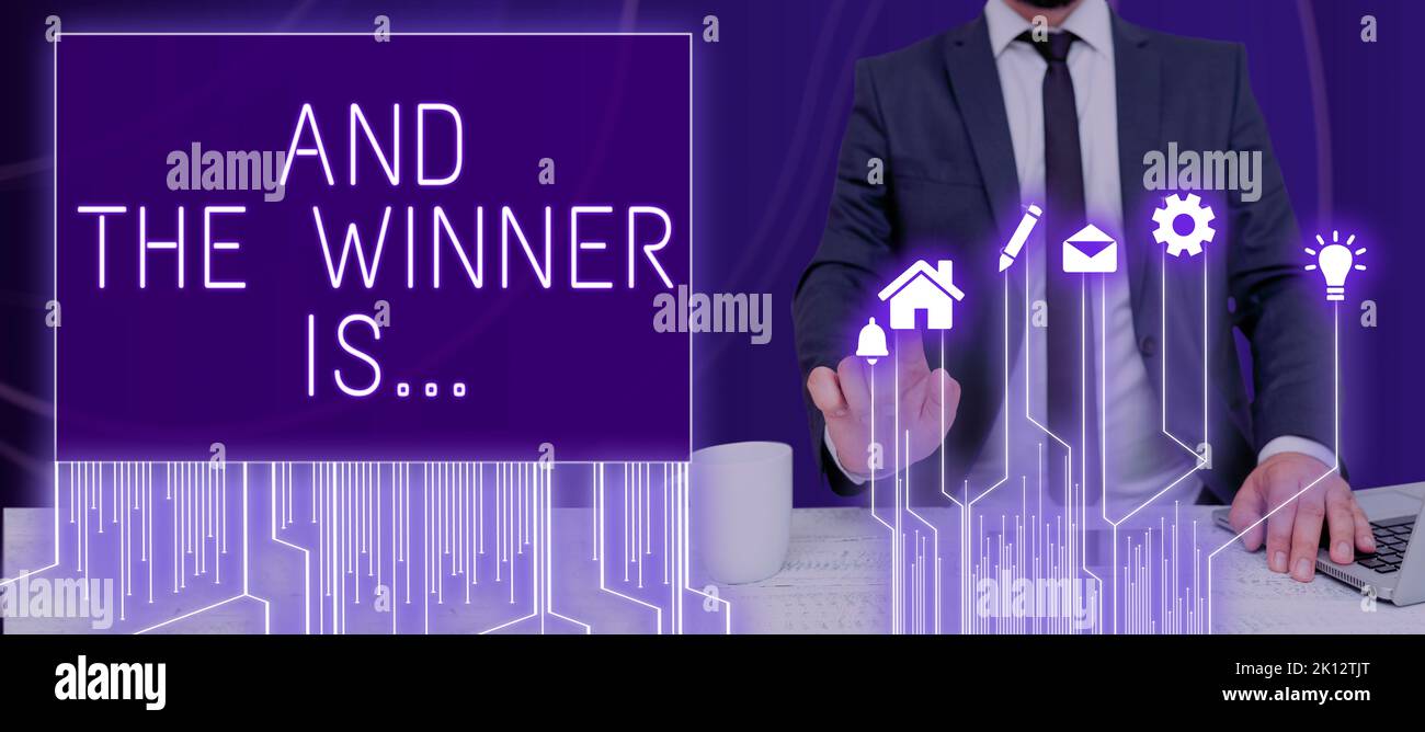 Text sign showing And The Winner Is.... Word Written on Announcing who ...