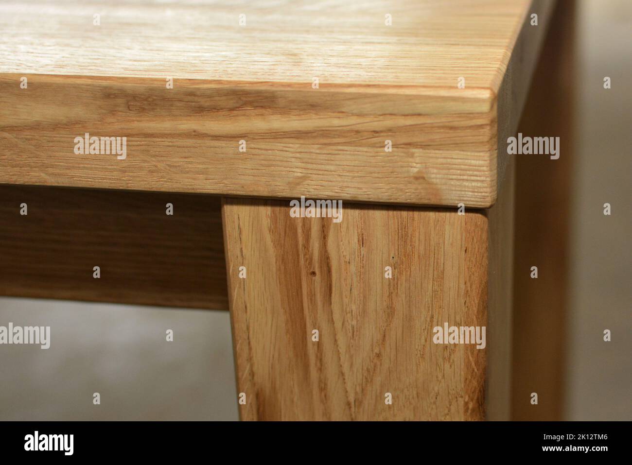 Wooden table corner and surface. Natural wood close view photo ...