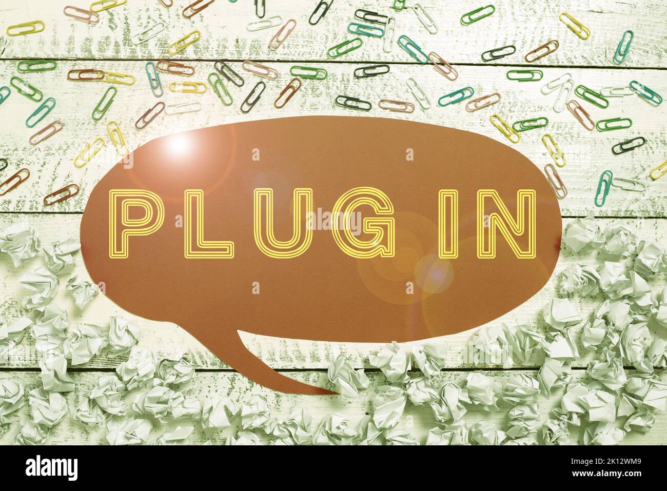 Hand writing sign Plug In. Word for putting device into electricity to ...