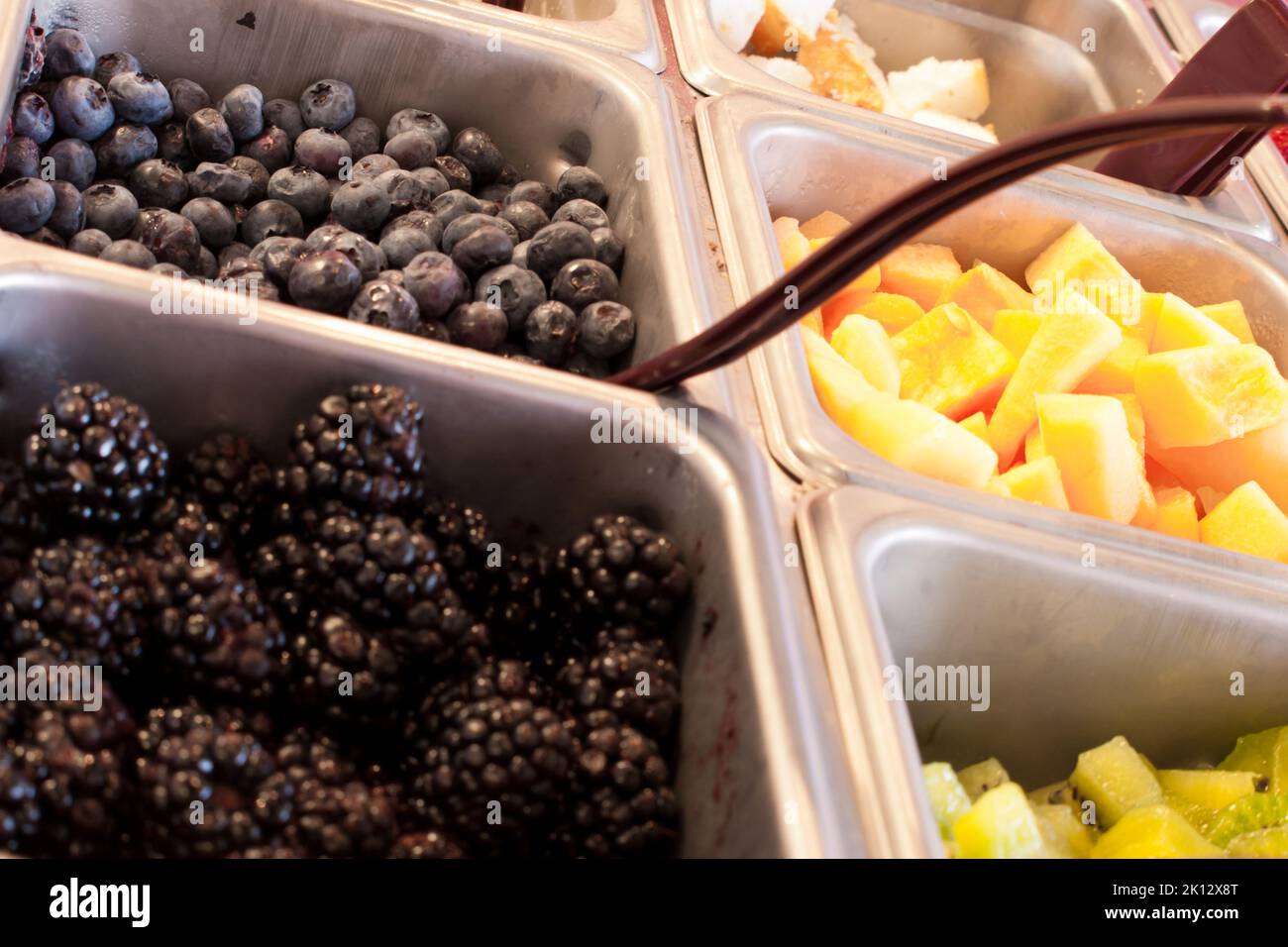 Frozen yogurt topping Stock Photo - Alamy