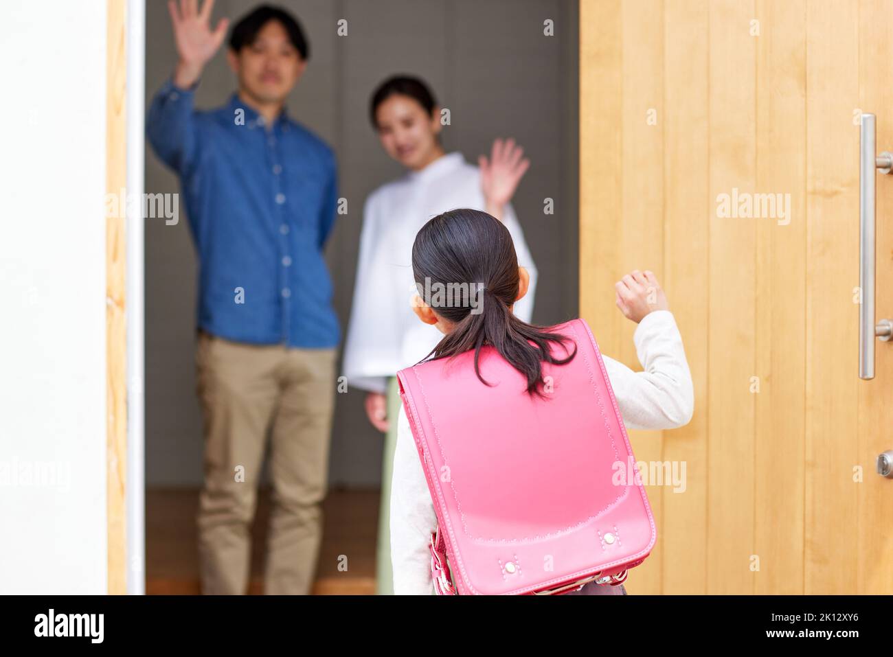 Japanese kid leaving home to go to school Stock Photo - Alamy