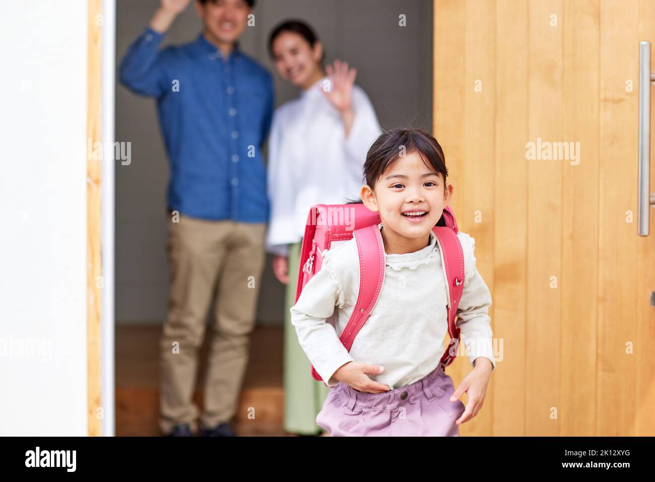 Japanese kid leaving home to go to school Stock Photo - Alamy