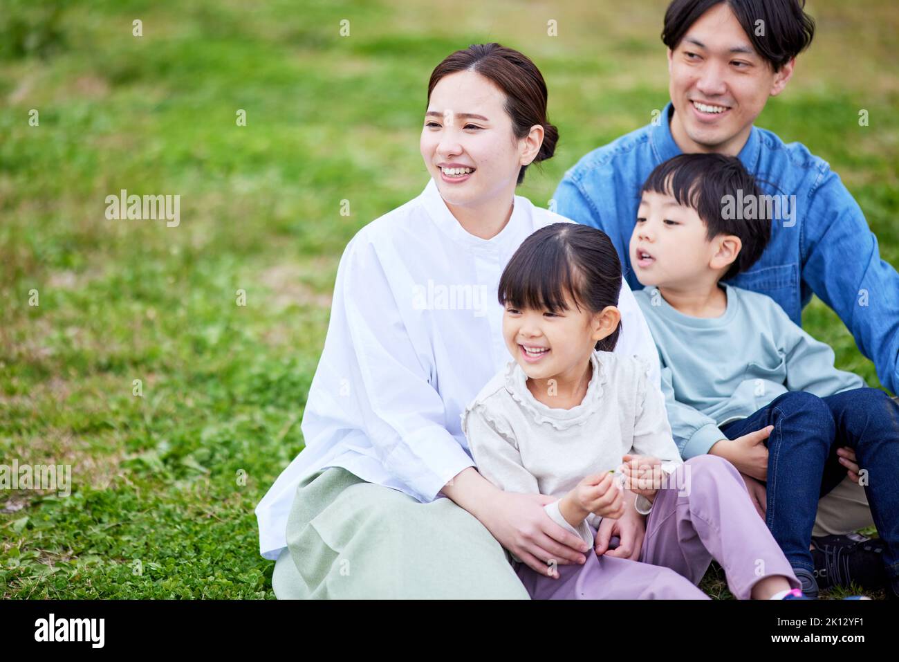 Japanese family in a city park Stock Photo - Alamy