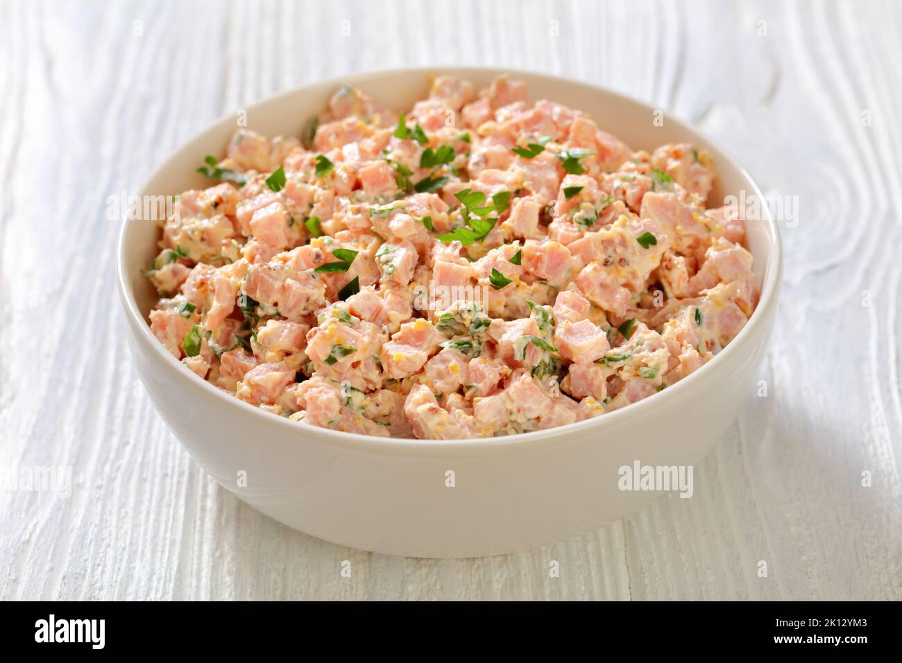 ham salad spread with creole mustard and mayonnaise dressing in white ...