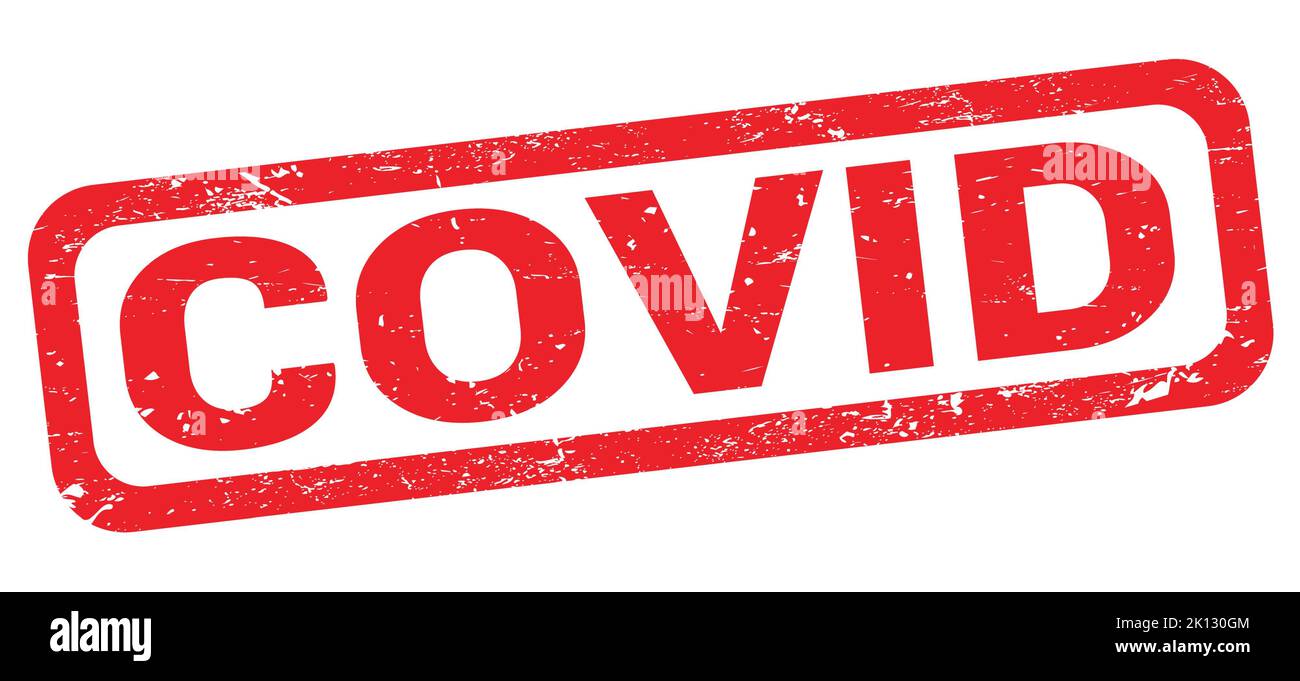 COVID text written on red rectangle stamp sign Stock Photo - Alamy