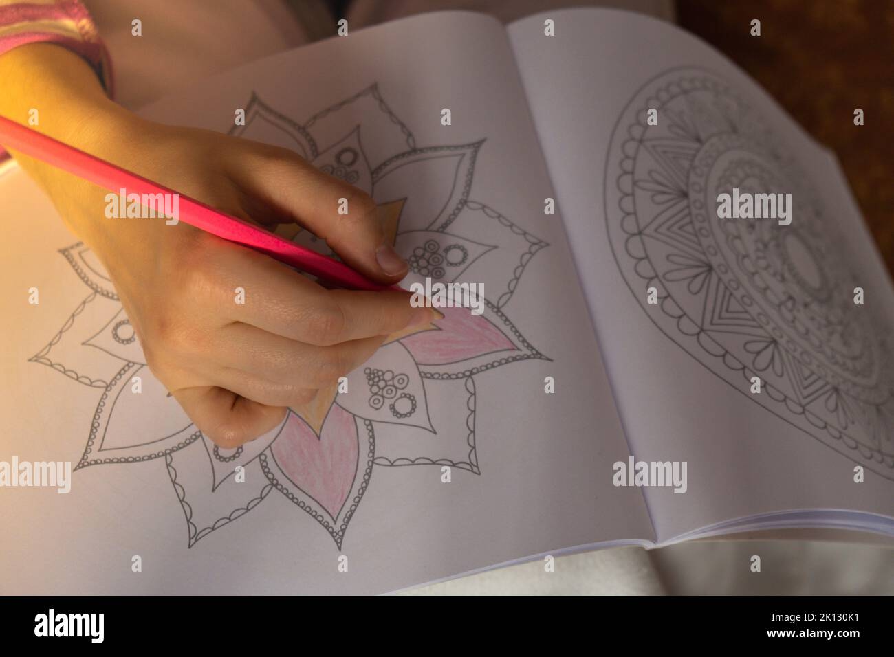 Woman coloring antistress page. Female hand painting mandala. Female ...