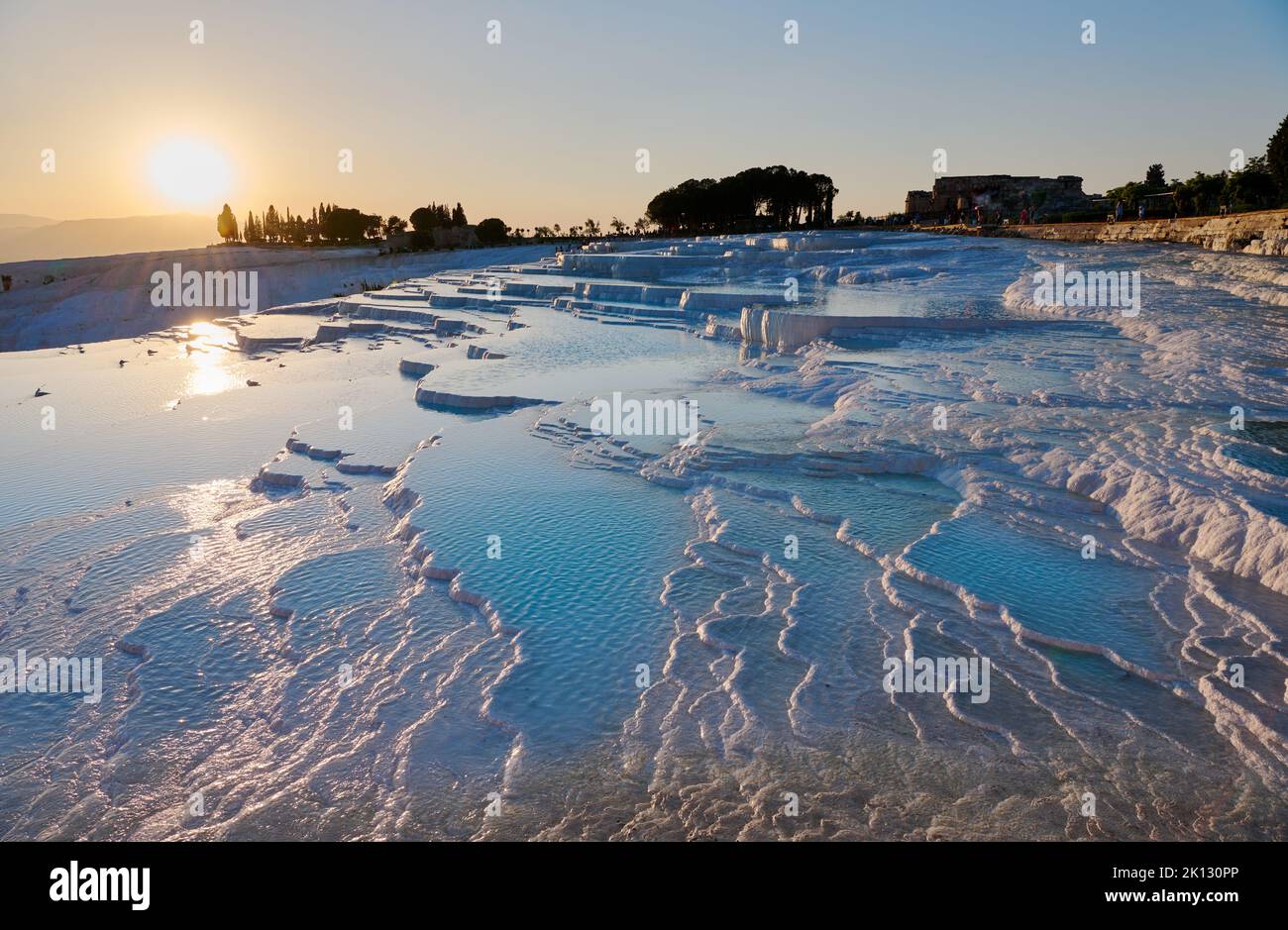 sunset behind Pamukkale travertine terraces, Denizli, Turkey Stock ...