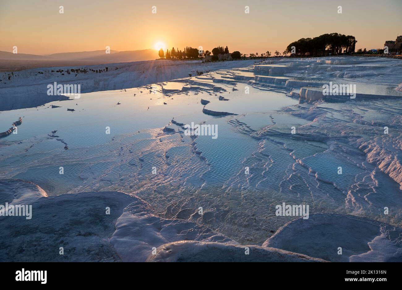sunset behind Pamukkale travertine terraces, Denizli, Turkey Stock ...