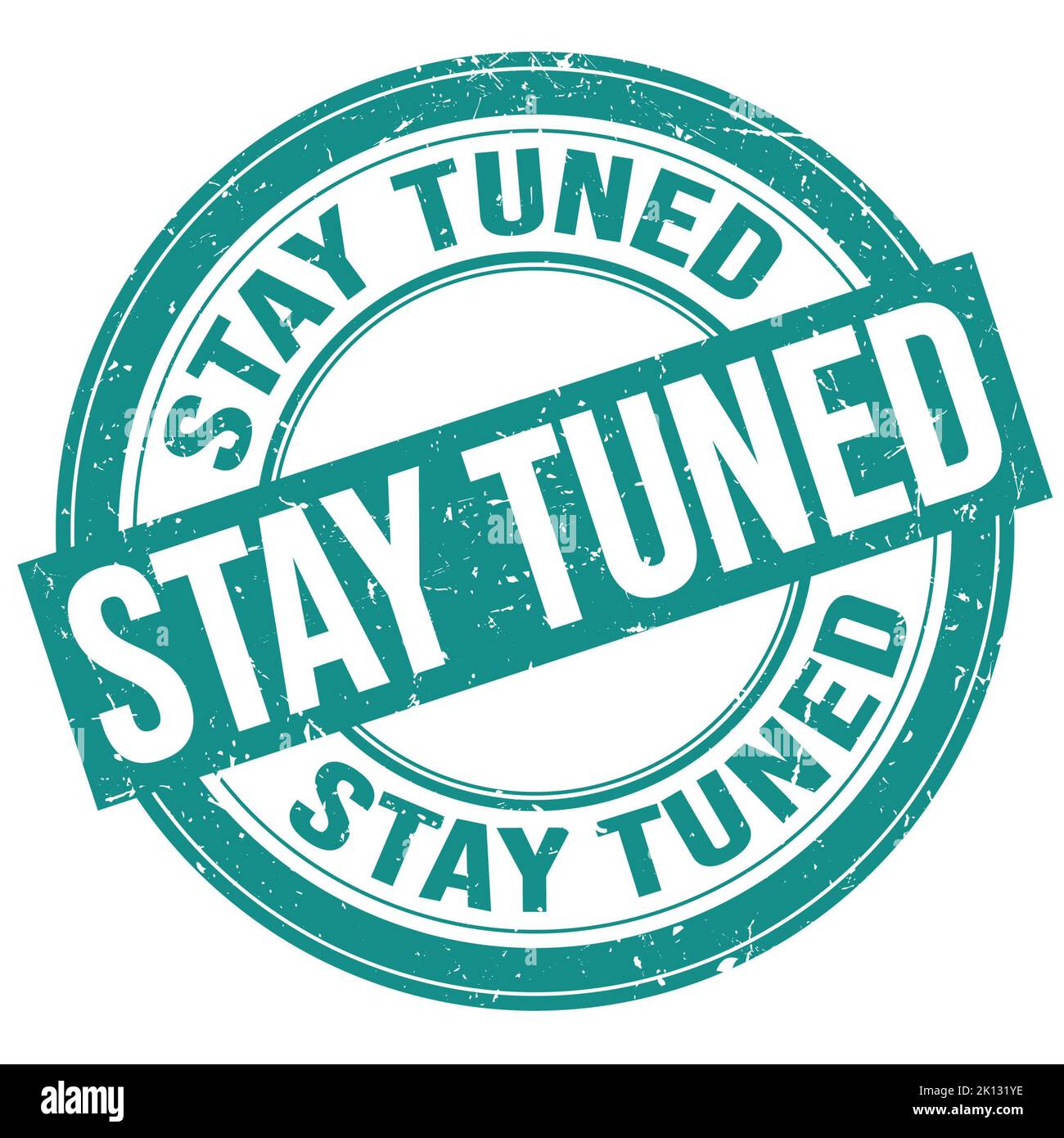 STAY TUNED text written on blue round grungy stamp sign Stock Photo - Alamy
