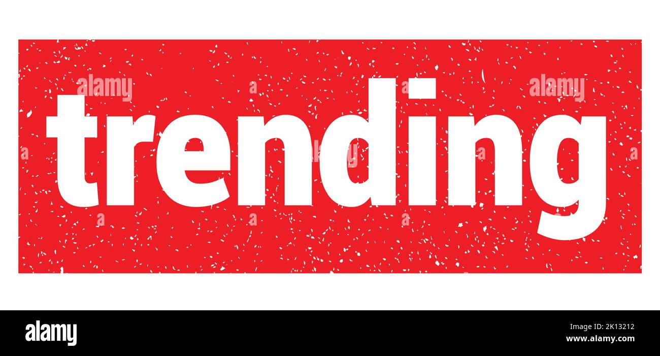 trending text written on red grungy stamp sign Stock Photo - Alamy