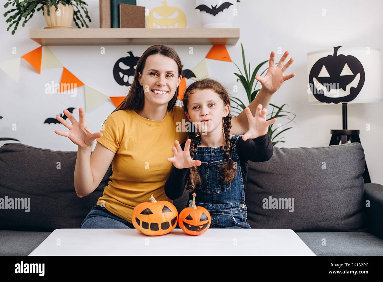 Portrait of happy smiling kid daughter and beautiful young mother ...