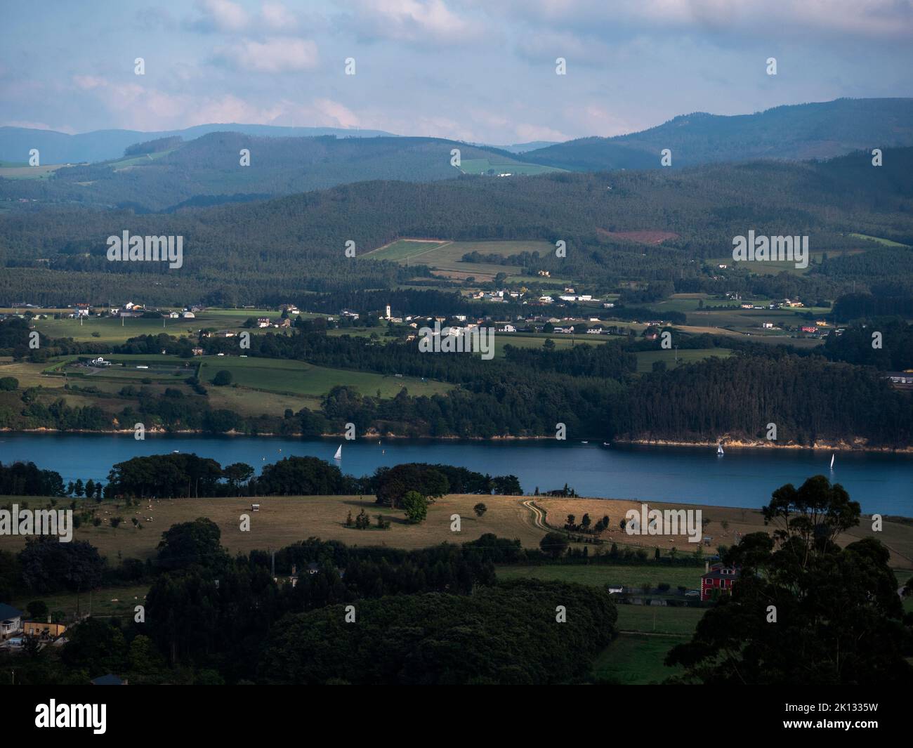 Farms and meadows at both side of the Eo estuary in northern Spain ...