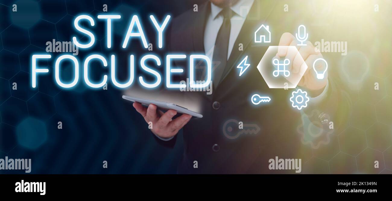 Handwriting text Stay Focused. Business overview Be attentive Concentrate Prioritize the task ...